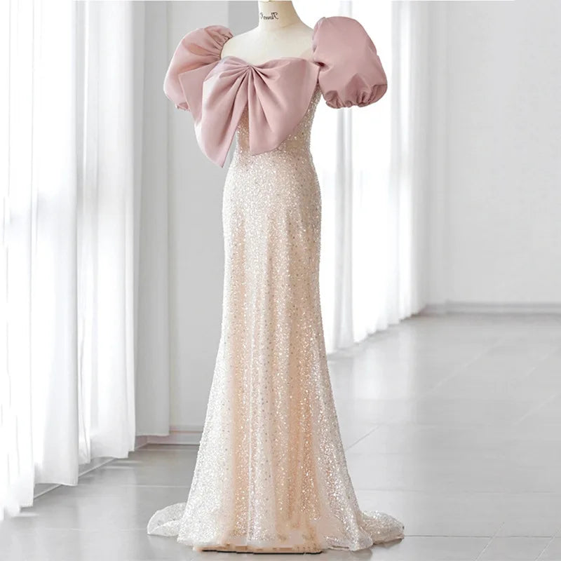 Glittering Gown With Dramatic Bow And Sleeves on Luulla